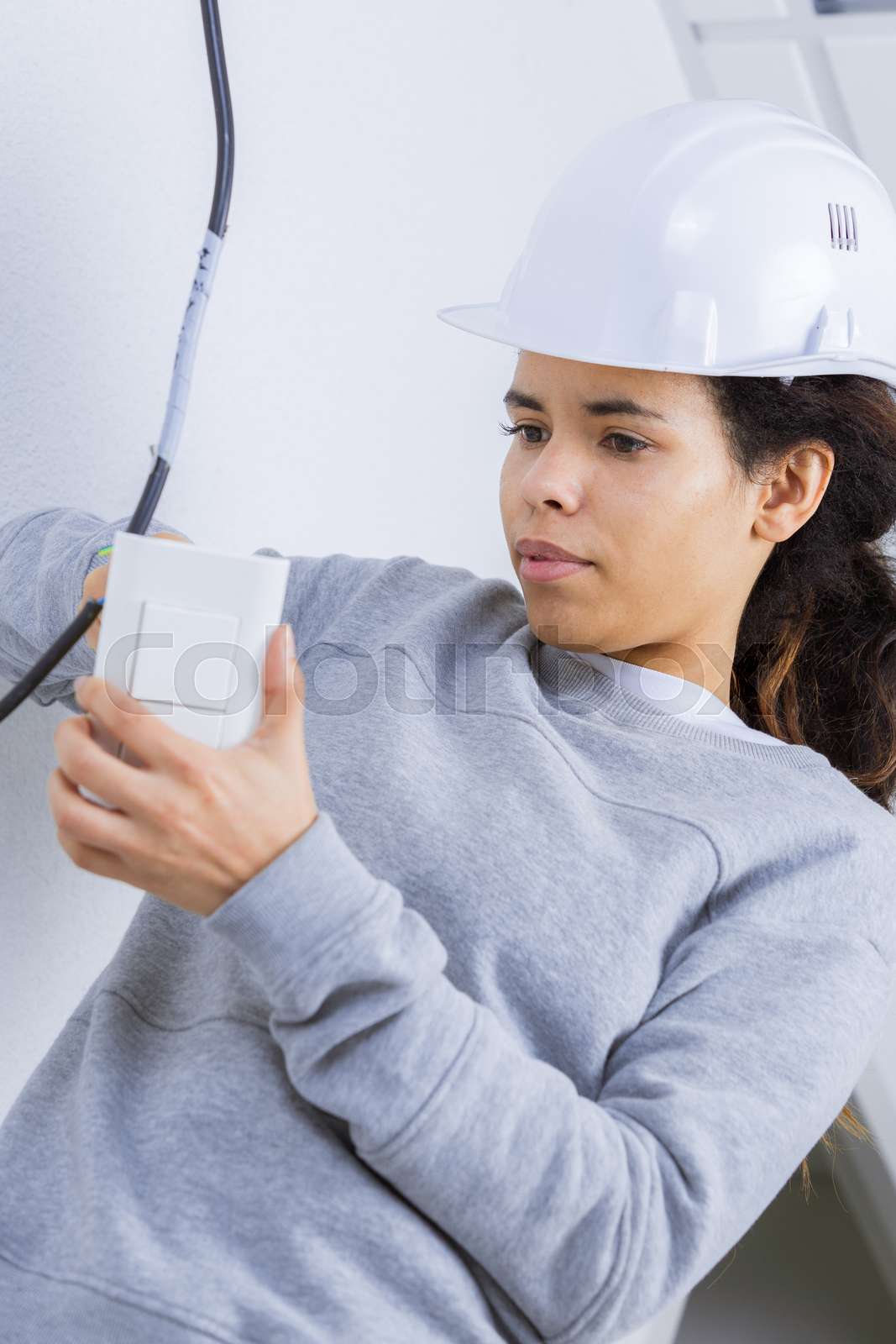 connecting the wires | Stock image | Colourbox