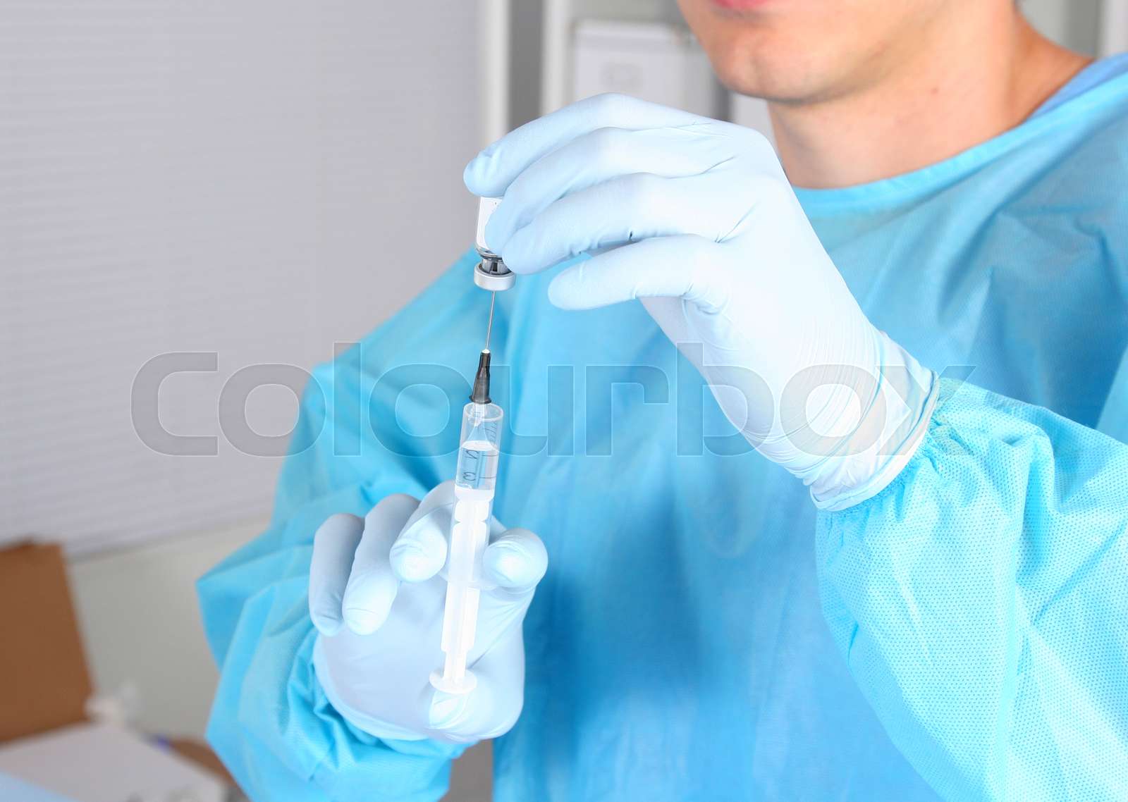 Syringe, medical injection in hand, palm or fingers. Medicine plastic ...