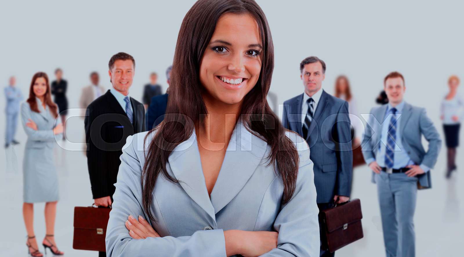 business woman and her team | Stock image | Colourbox
