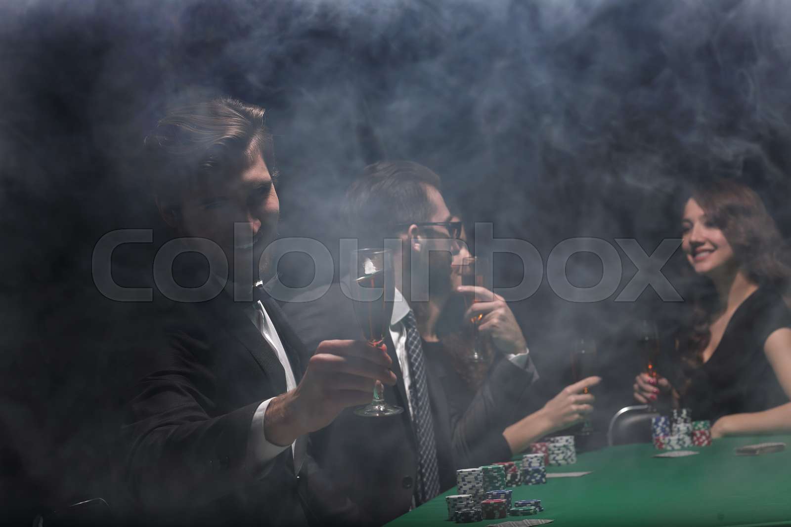 Happy and rich people celebrating their win after successful game ...