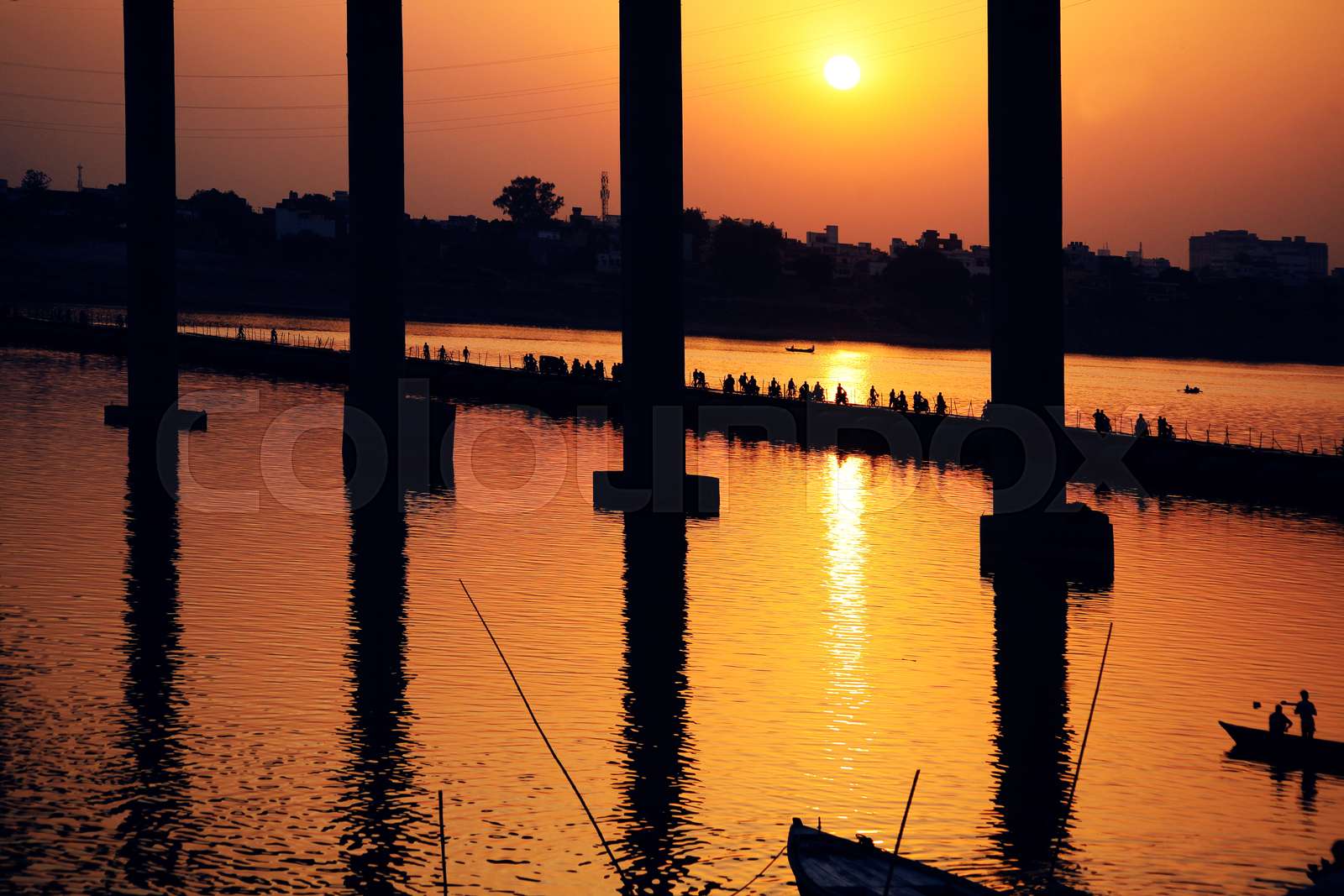 Ganges River and people at sunrise in Varanasi, India | Stock image ...