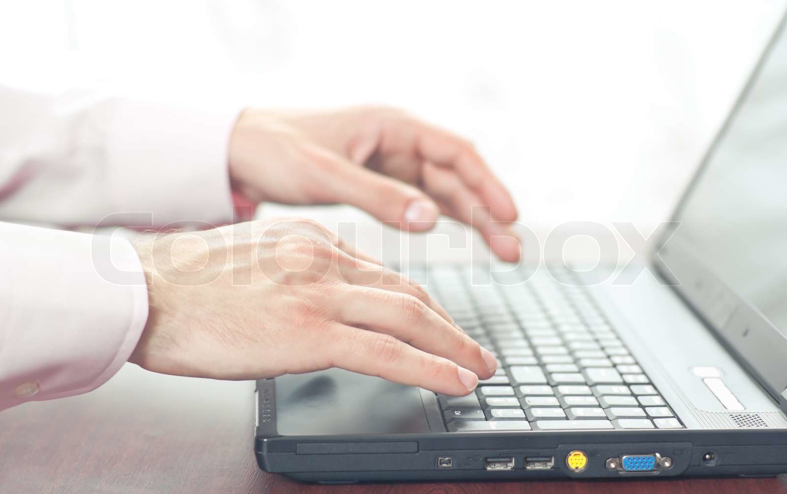 Hands on a Keyboard of laptop | Stock image | Colourbox