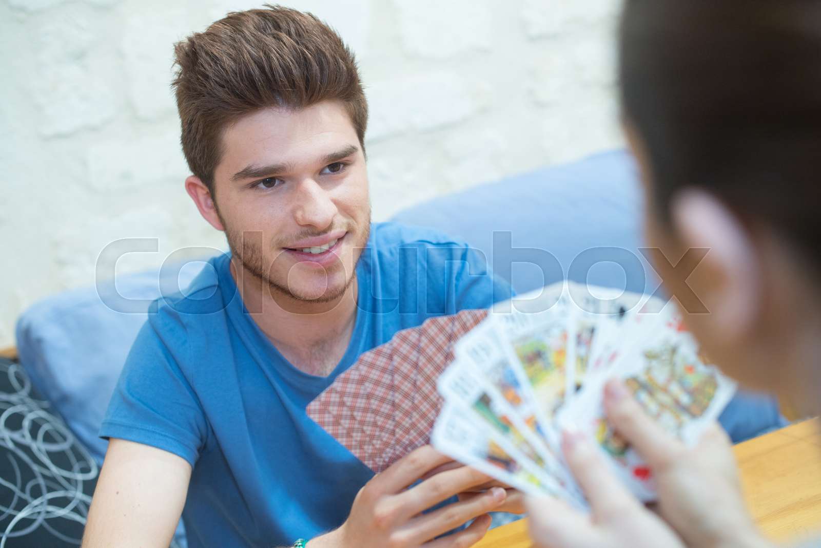 friends playing cards | Stock image | Colourbox