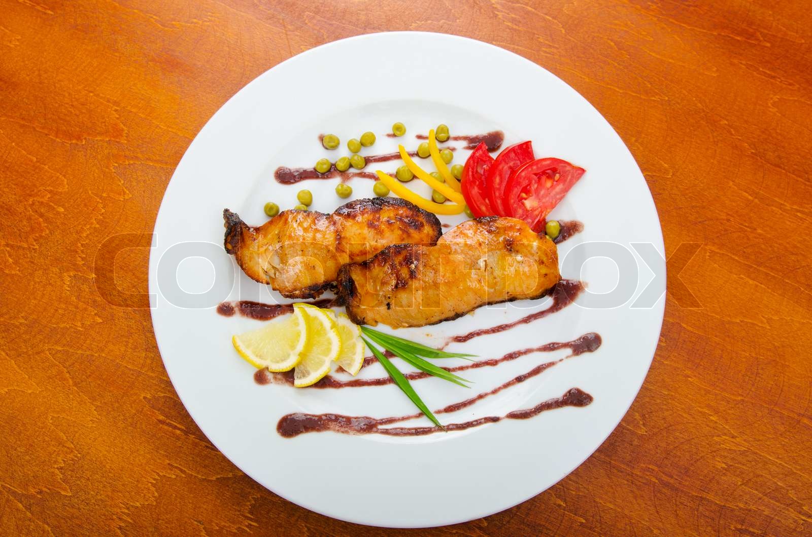 Fried fish in the plate | Stock image | Colourbox