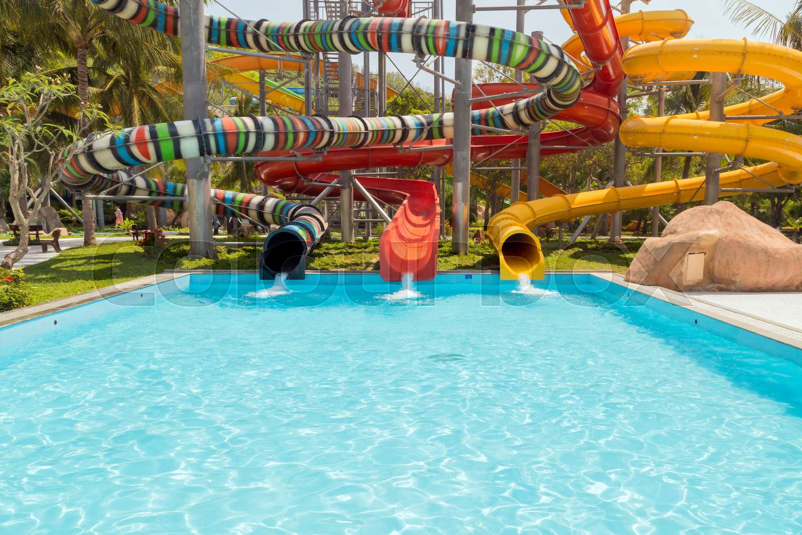 Sliders in the water park swimming pool | Stock image | Colourbox