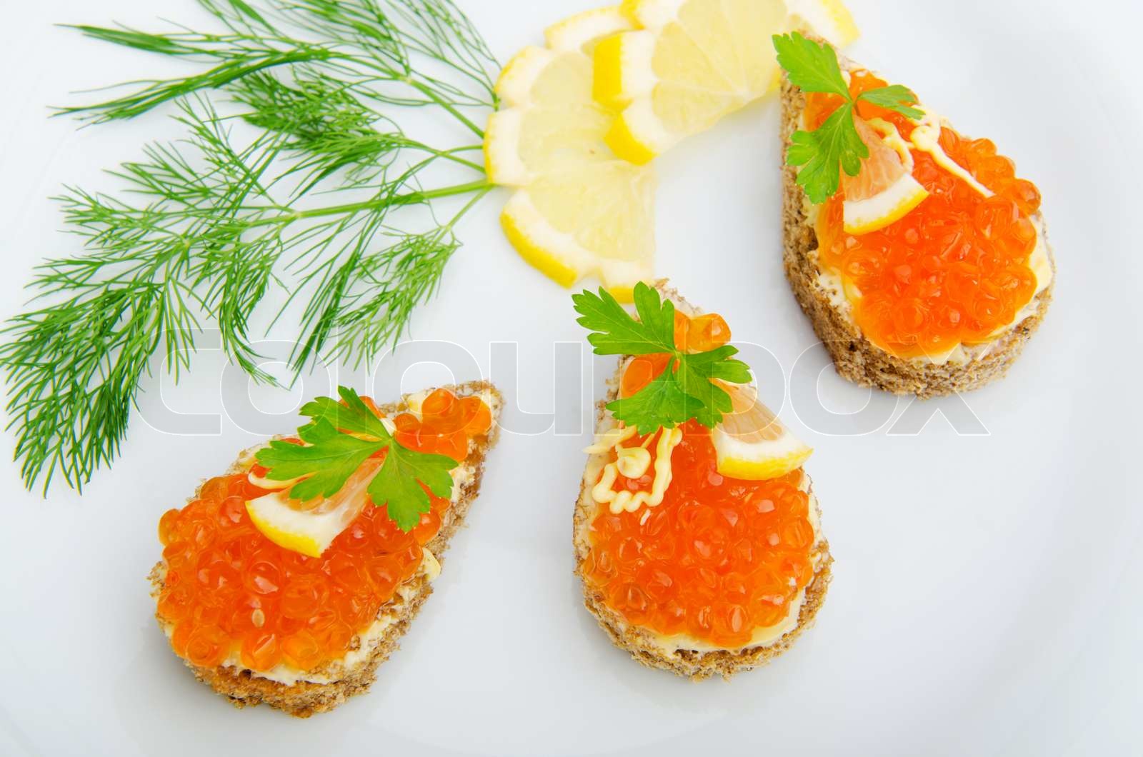 Red caviar served in the plate | Stock image | Colourbox