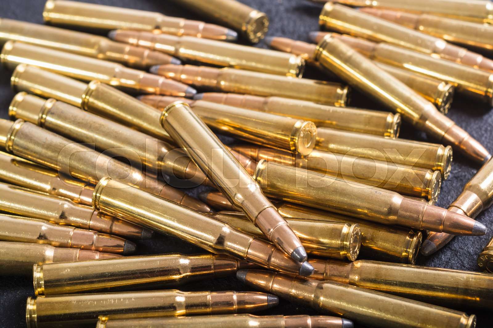 Gun cartridge 8mm caliber | Stock image | Colourbox