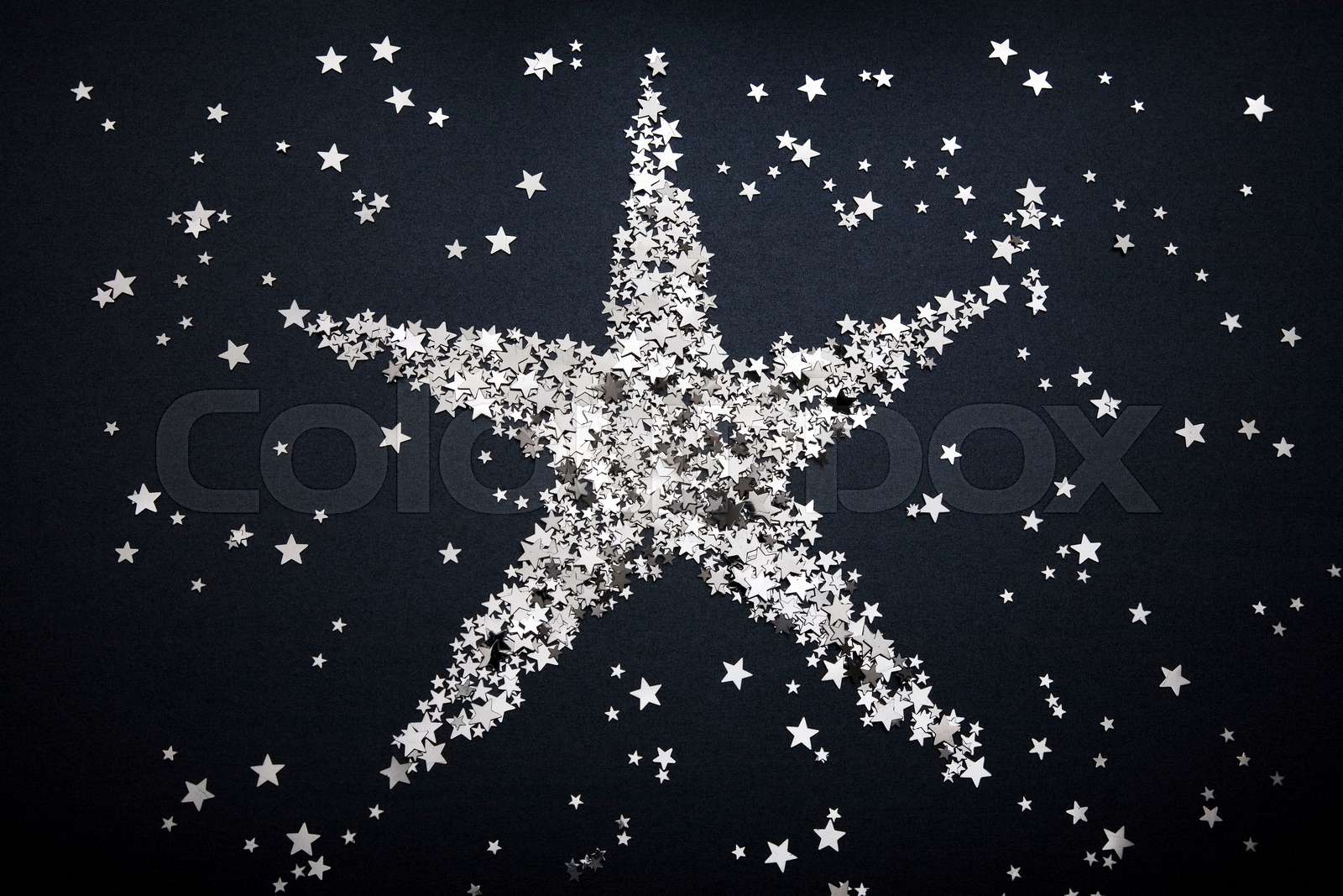 Star shape made of small stars | Stock image | Colourbox