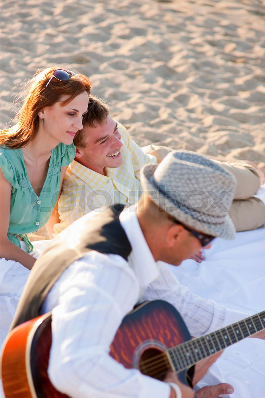 People relaxing together on beach | Stock image | Colourbox
