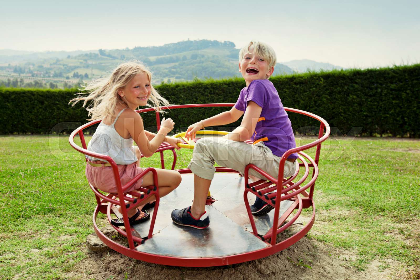 Children playing in backyard | Stock image | Colourbox
