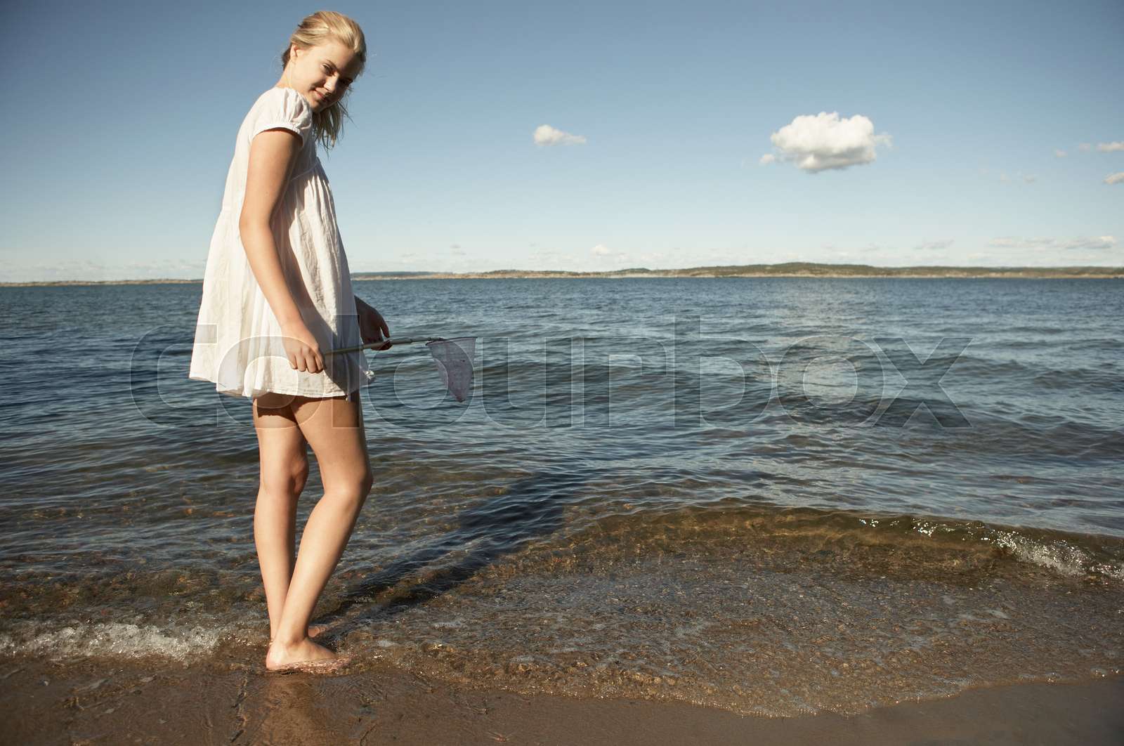 Young woman at beach | Stock image | Colourbox