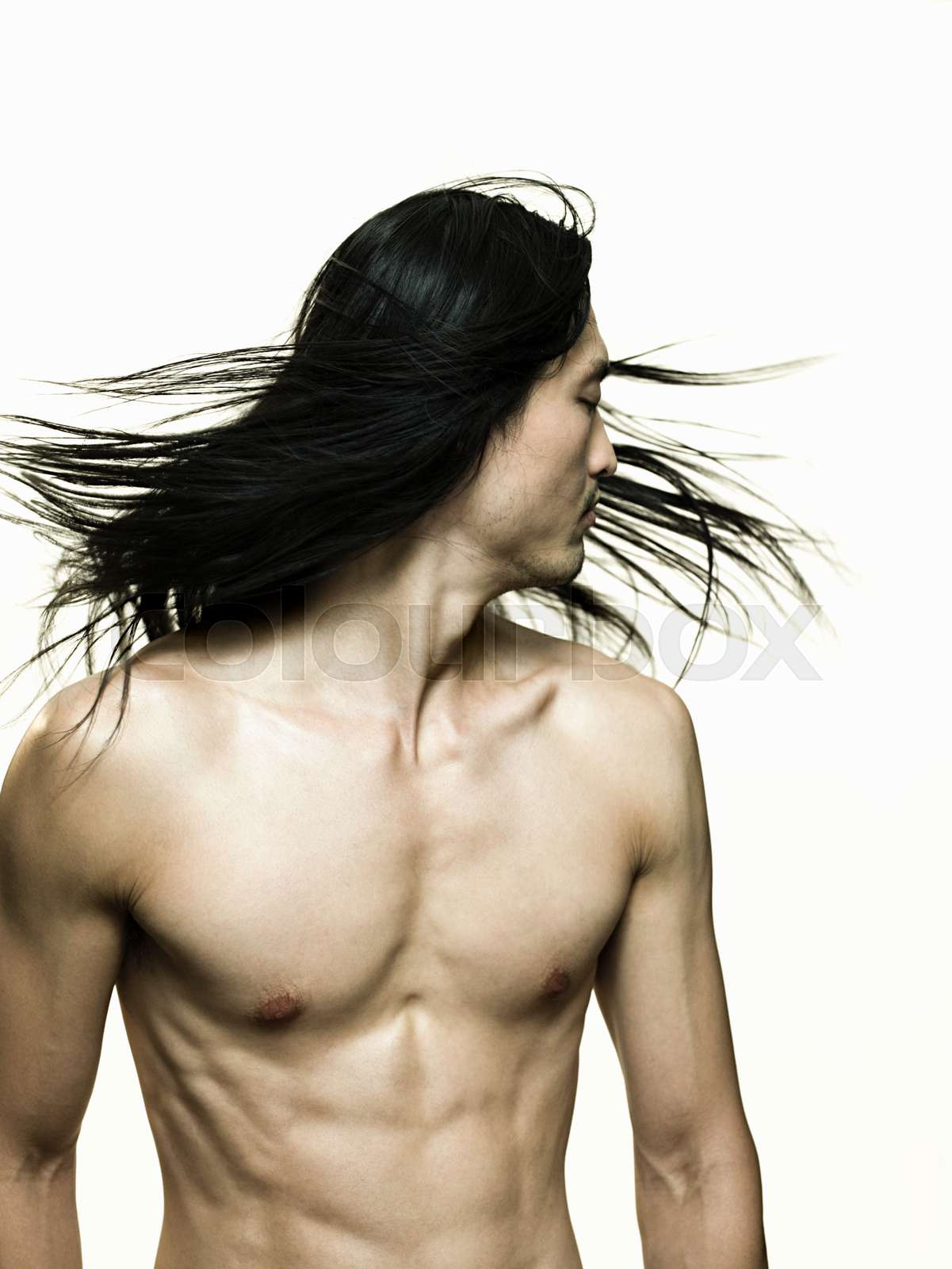 Man shaking his hair | Stock image | Colourbox