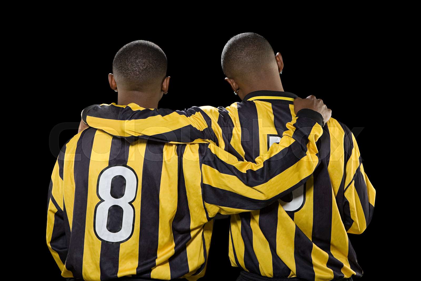 Rear view of footballers | Stock image | Colourbox