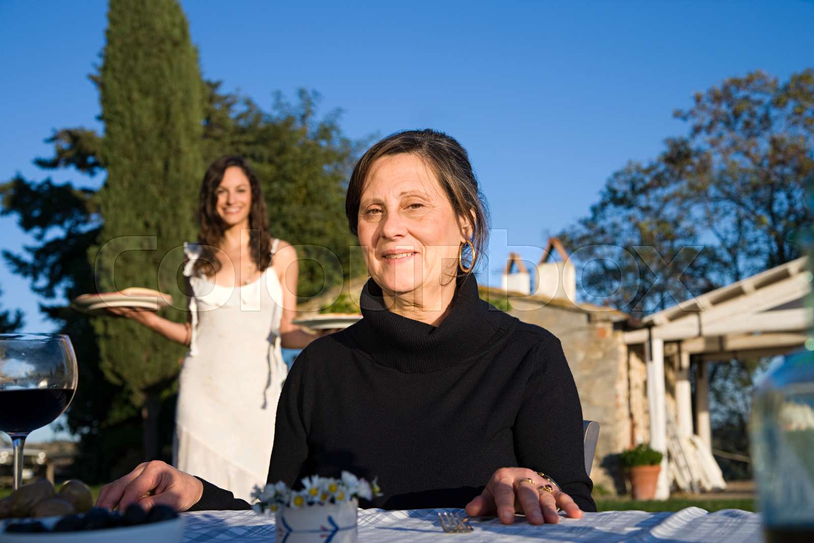 Italian mother and daughter at lunch | Stock image | Colourbox