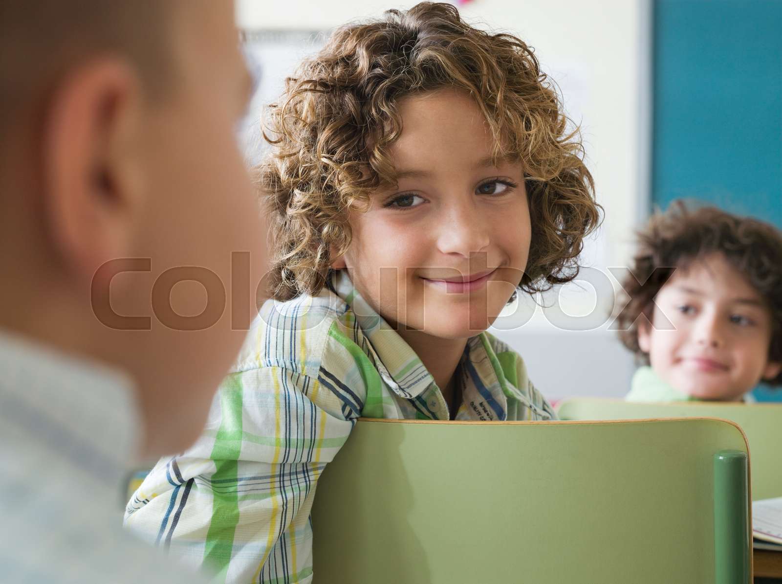 Children sat in a lesson | Stock image | Colourbox