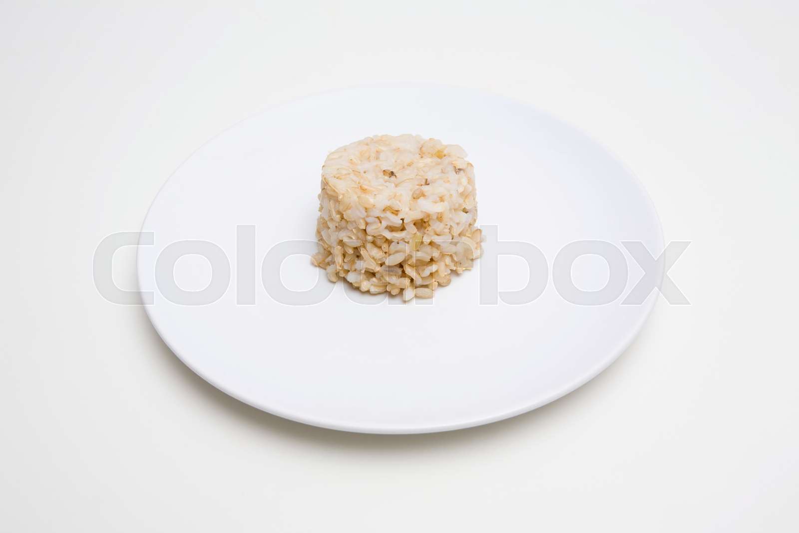 Stack of brown rice | Stock image | Colourbox