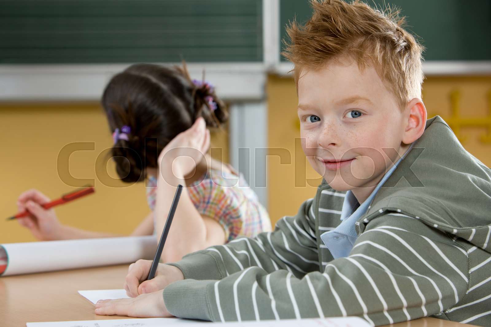 Boy in classroom | Stock image | Colourbox