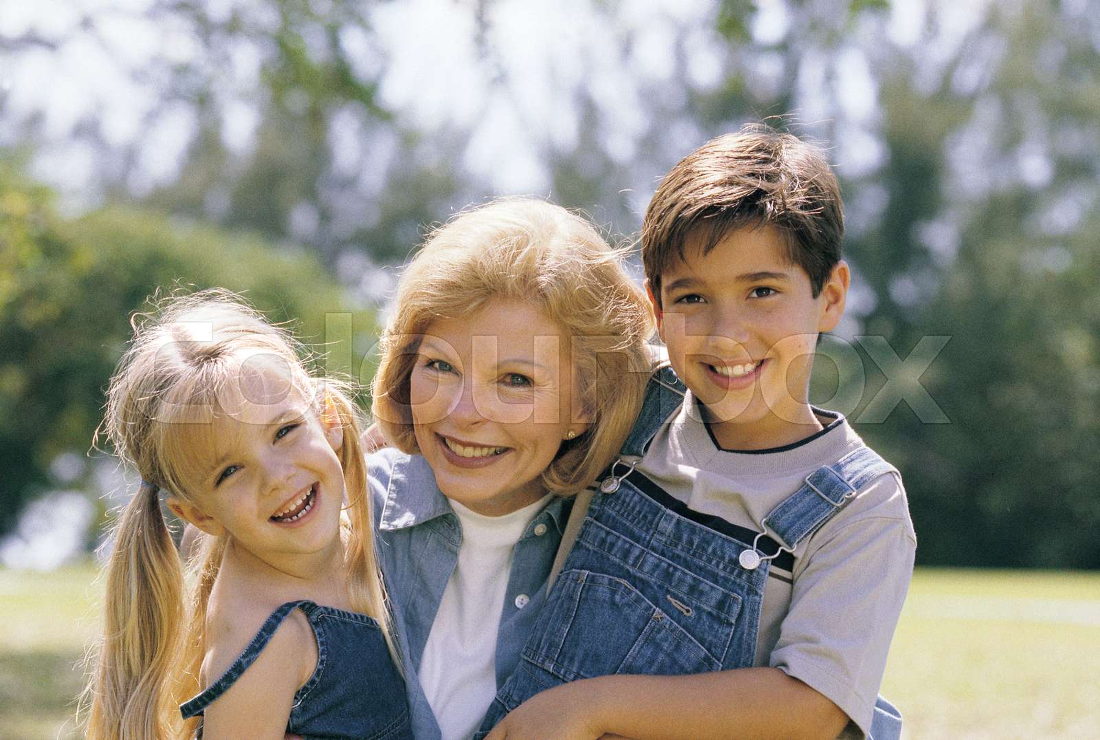 Mature woman and children | Stock image | Colourbox