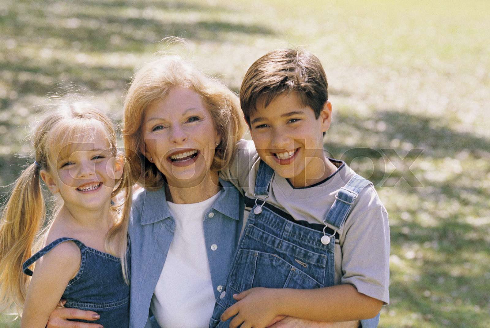 Mature woman and children | Stock image | Colourbox