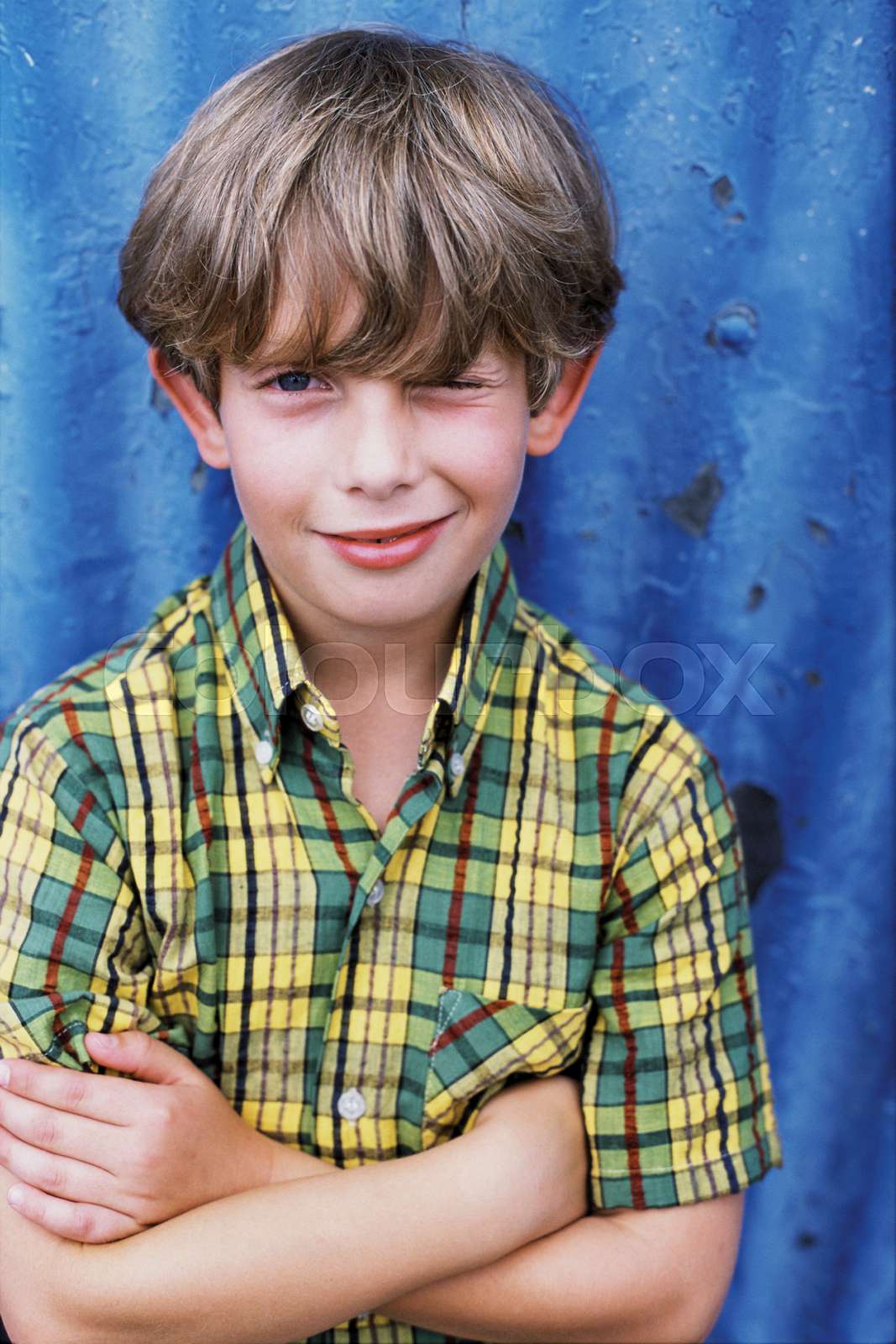 Boy winking | Stock image | Colourbox