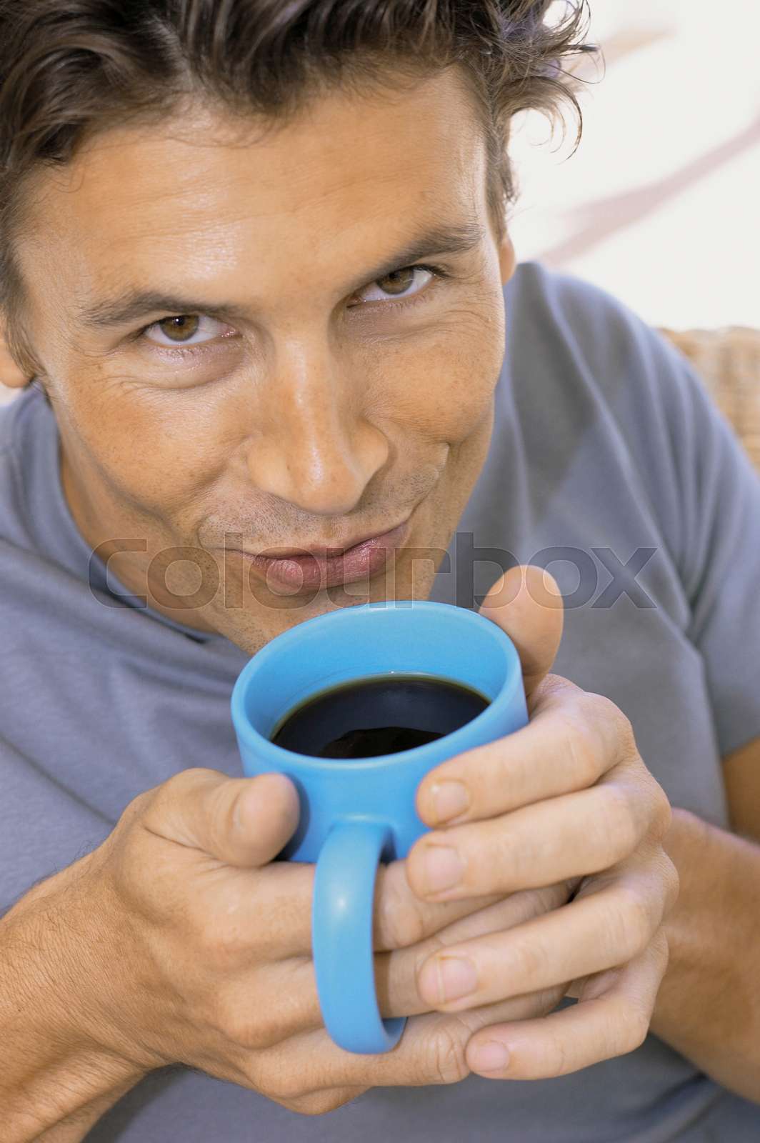 Man drinking coffee | Stock image | Colourbox