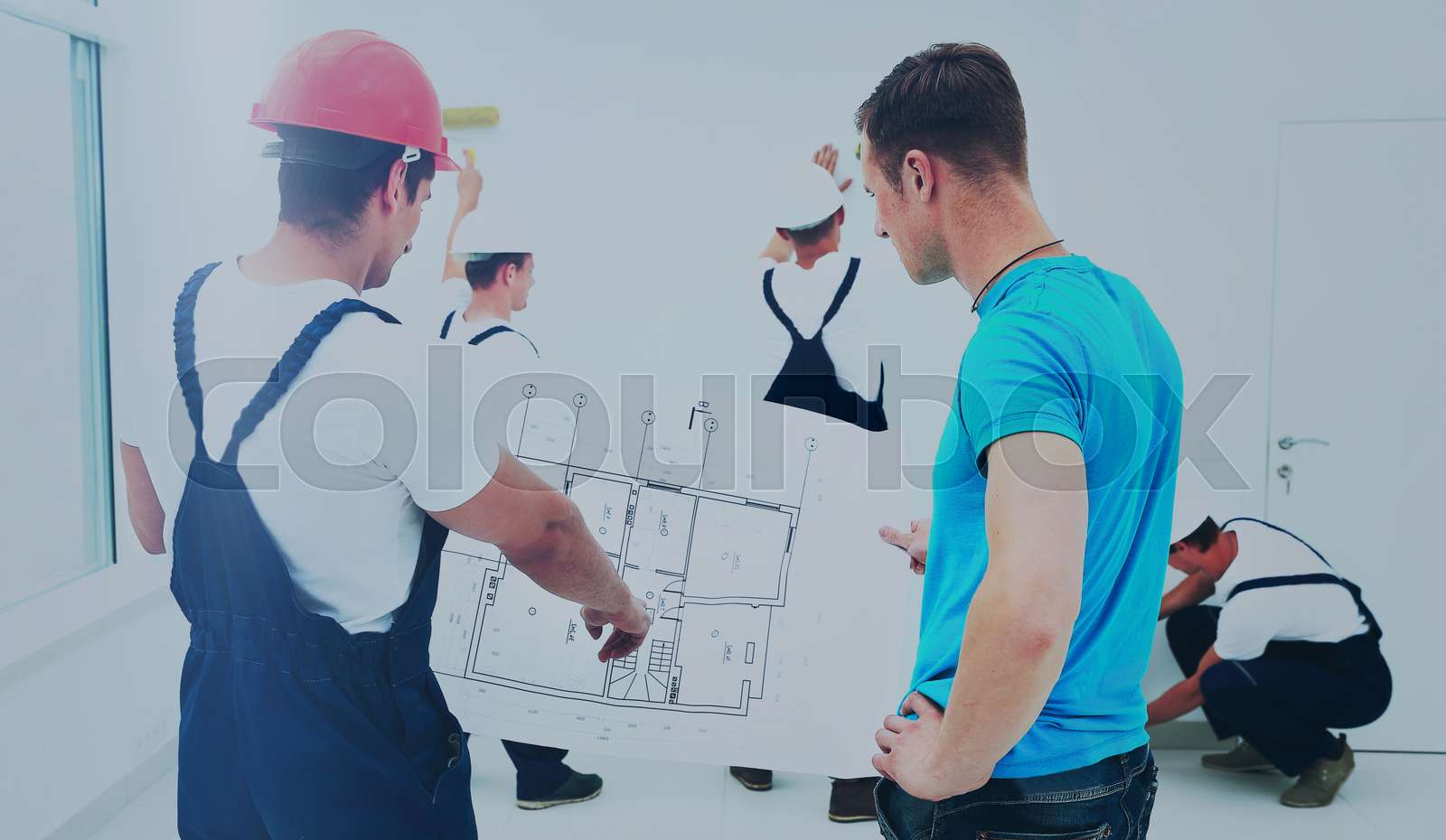 Architect and client discussing the plan of the building | Stock image ...