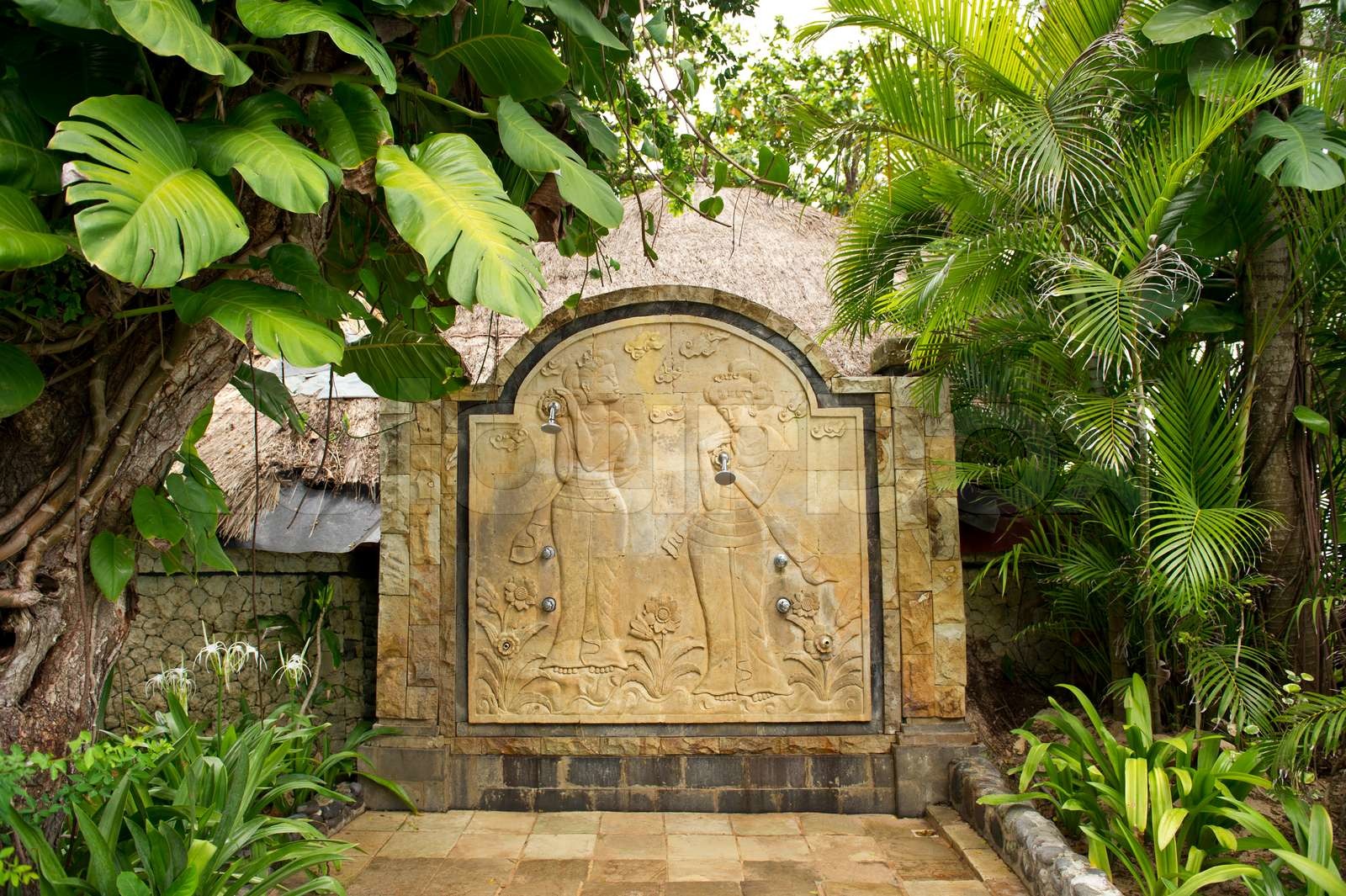 spa shower area outside tropical resort | Stock image | Colourbox