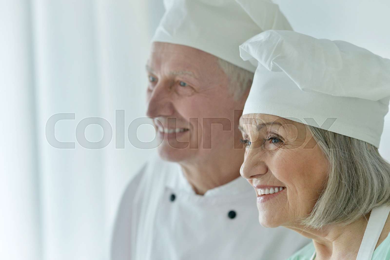 Senior chefs couple at kitchen | Stock image | Colourbox
