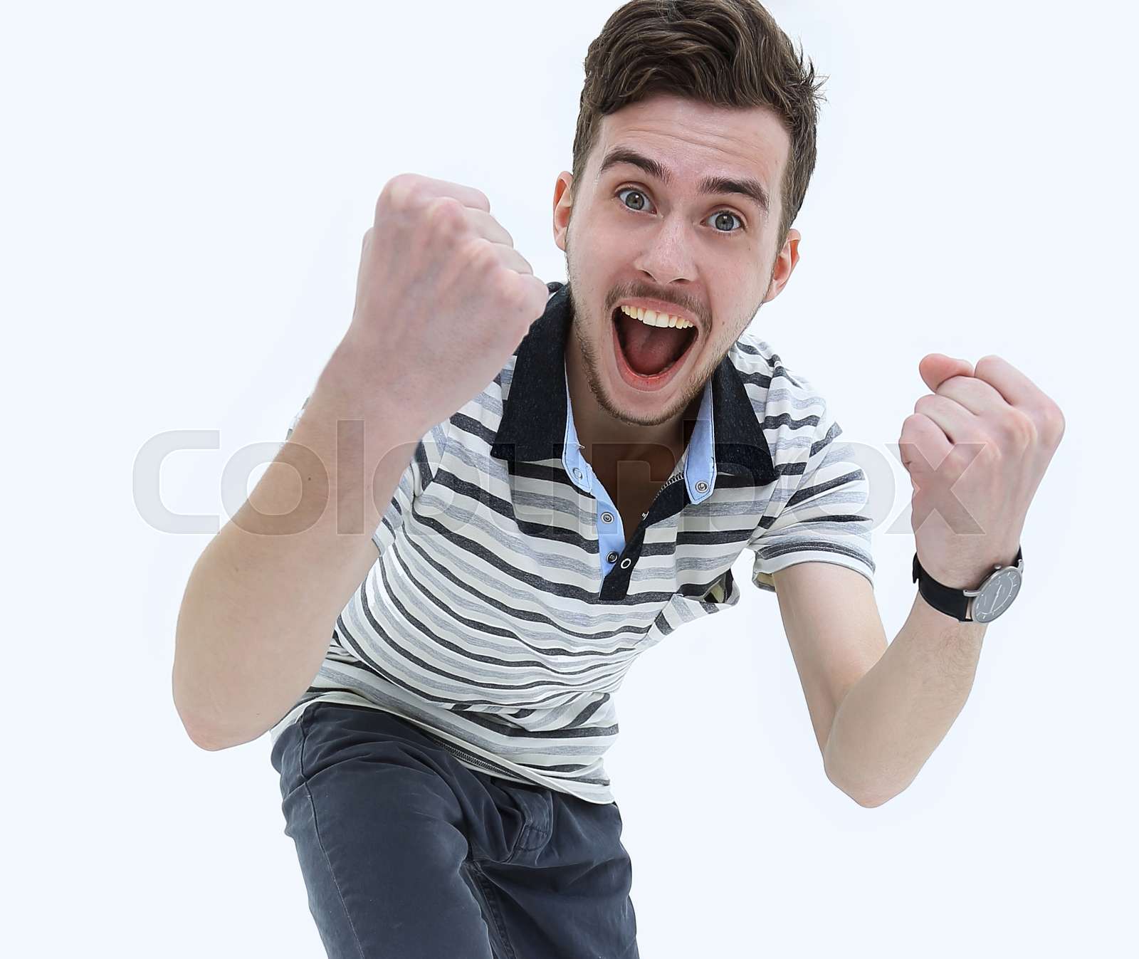 closeup. happy guy celebrating his success. | Stock image | Colourbox