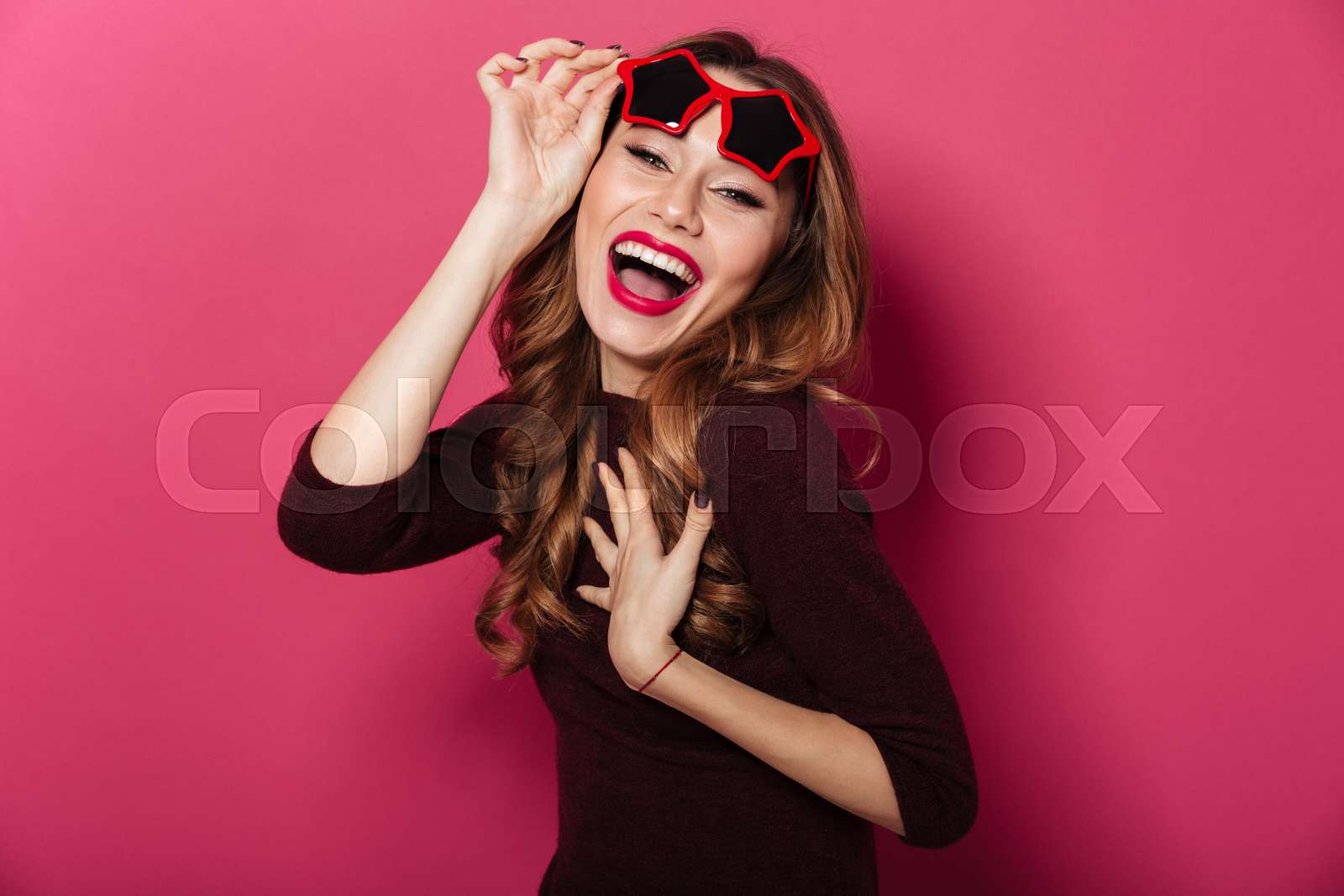 Laughing lady wearing sunglasses | Stock image | Colourbox