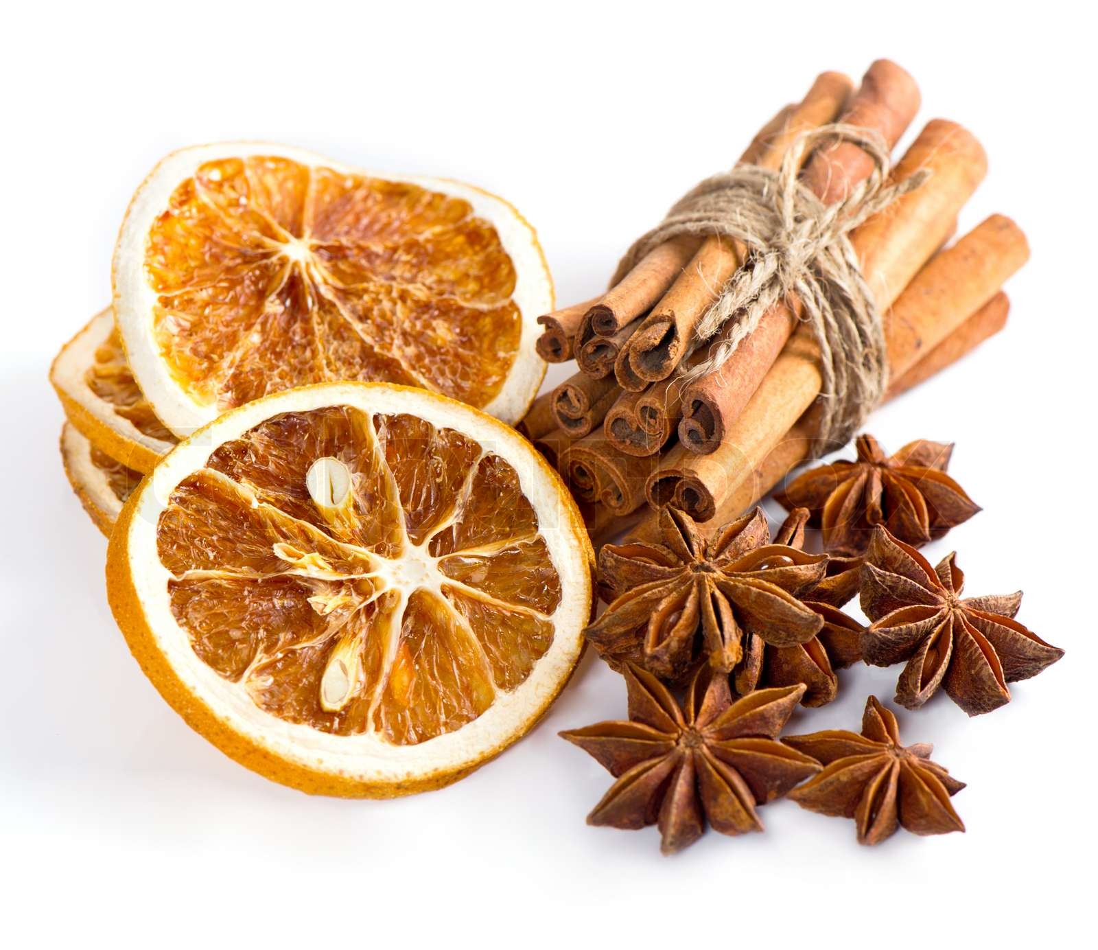 christmas spices cinnamon sticks, anise stars and sliced of dried ...
