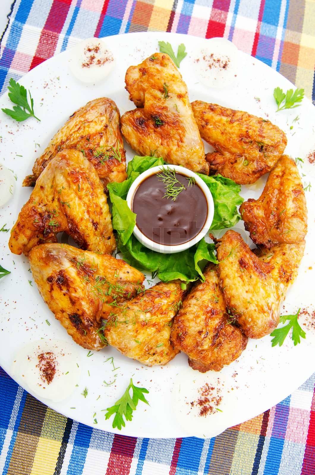 Chicken wings in the plate | Stock image | Colourbox