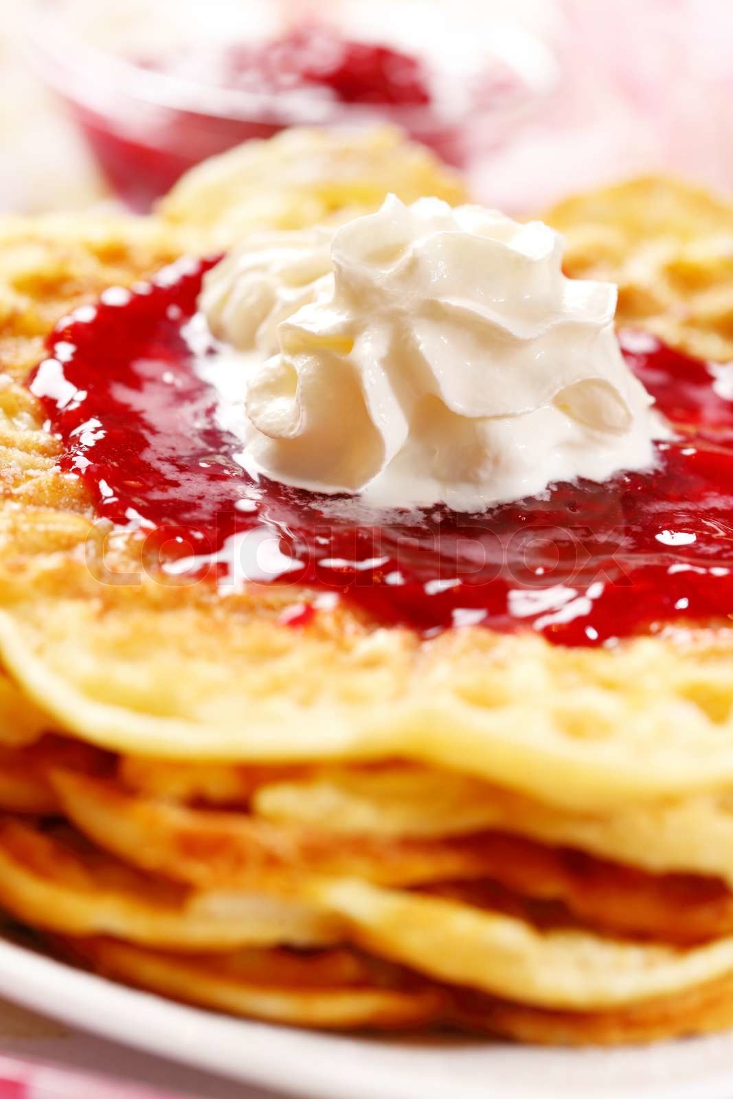 Waffles with fresh strawberry jam and whipped cream | Stock image ...