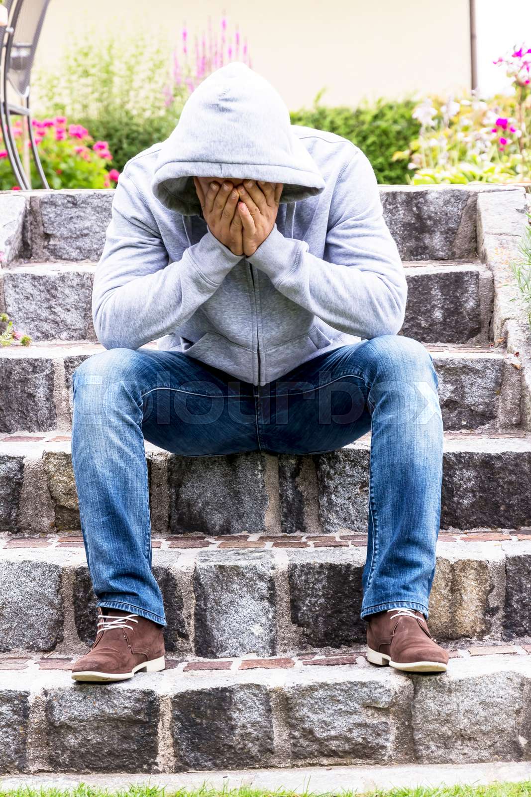 man is sitting on steps | Stock image | Colourbox