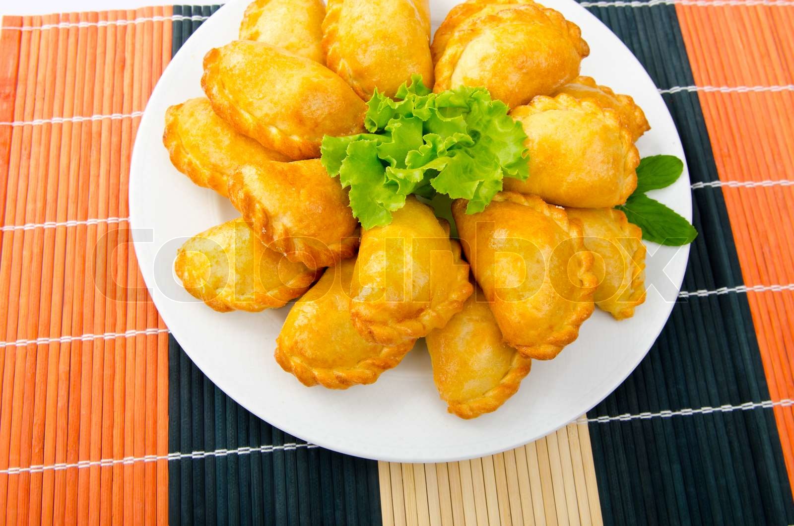 Meat patties in the plate | Stock image | Colourbox