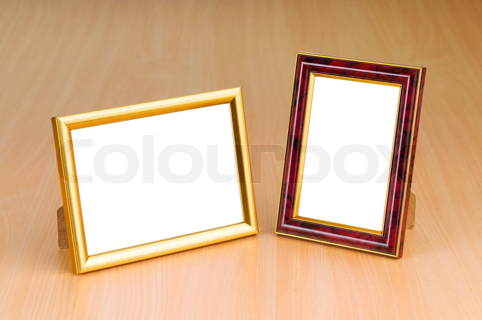 Photo frames on the table | Stock image | Colourbox