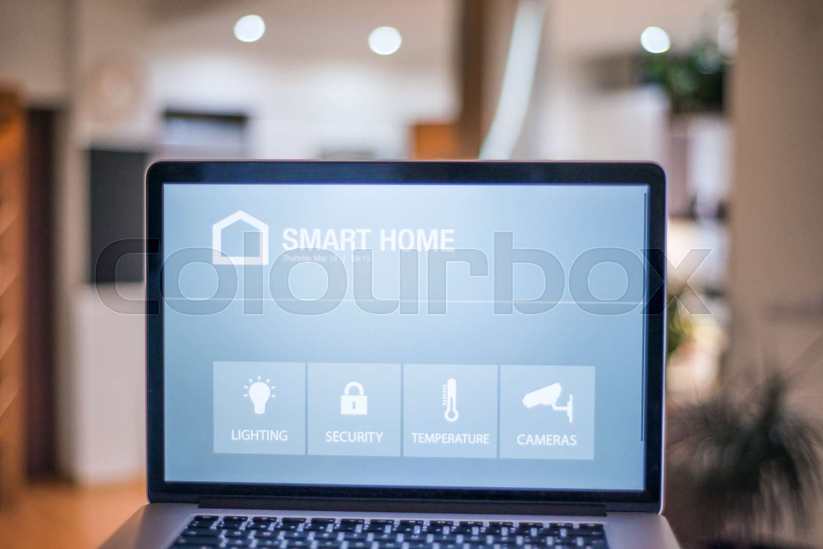 A laptop with smart home screen. | Stock image | Colourbox