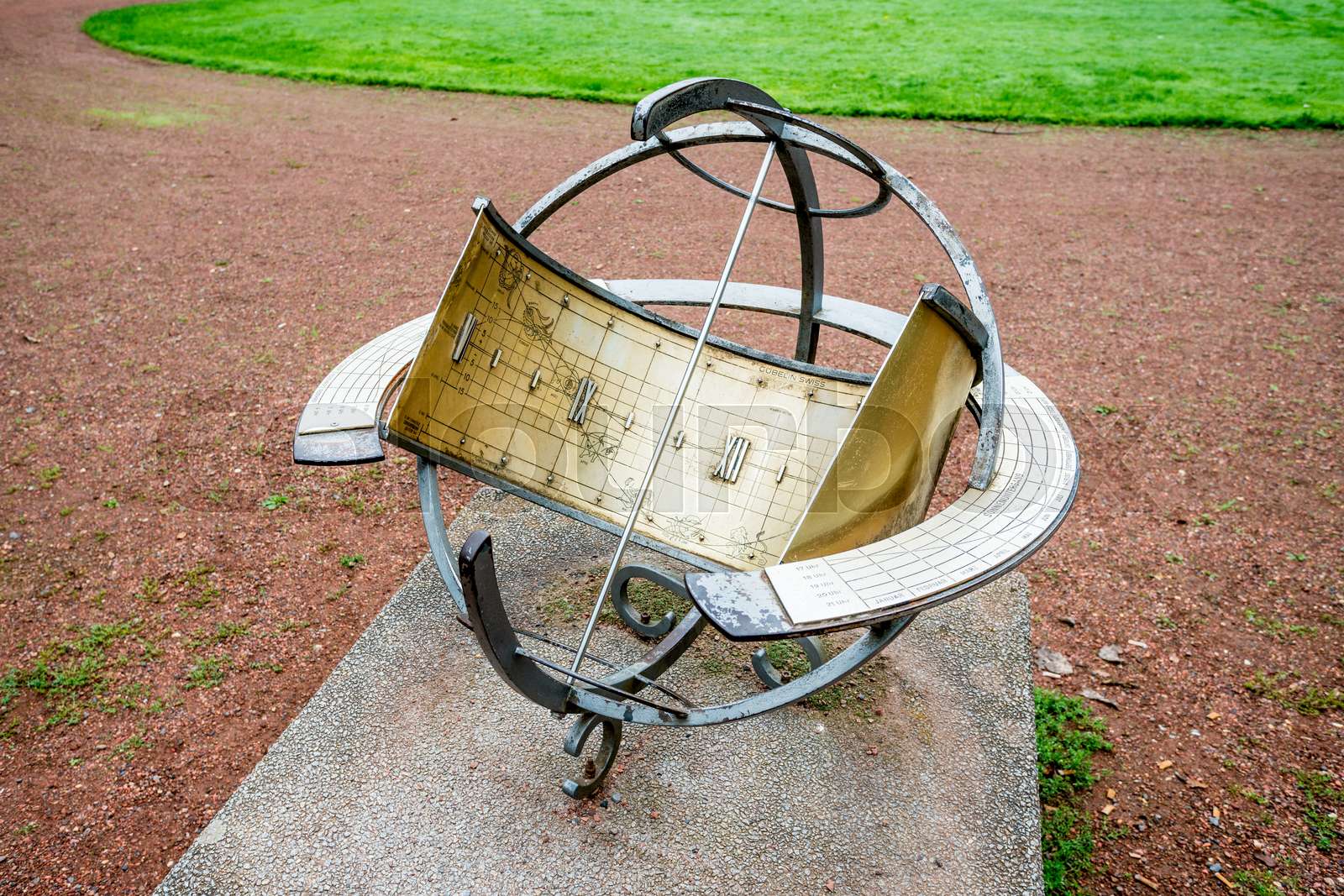 sundial. old sun clock dial in a garden | Stock image | Colourbox