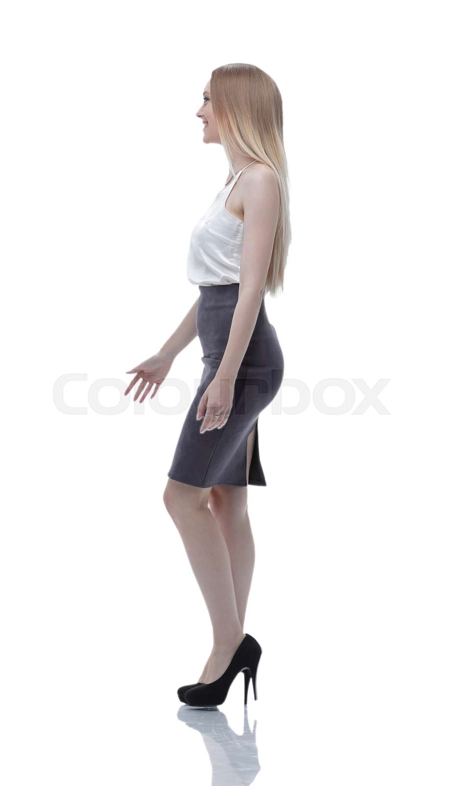side view. successful business woman is moving forward. photo in full ...