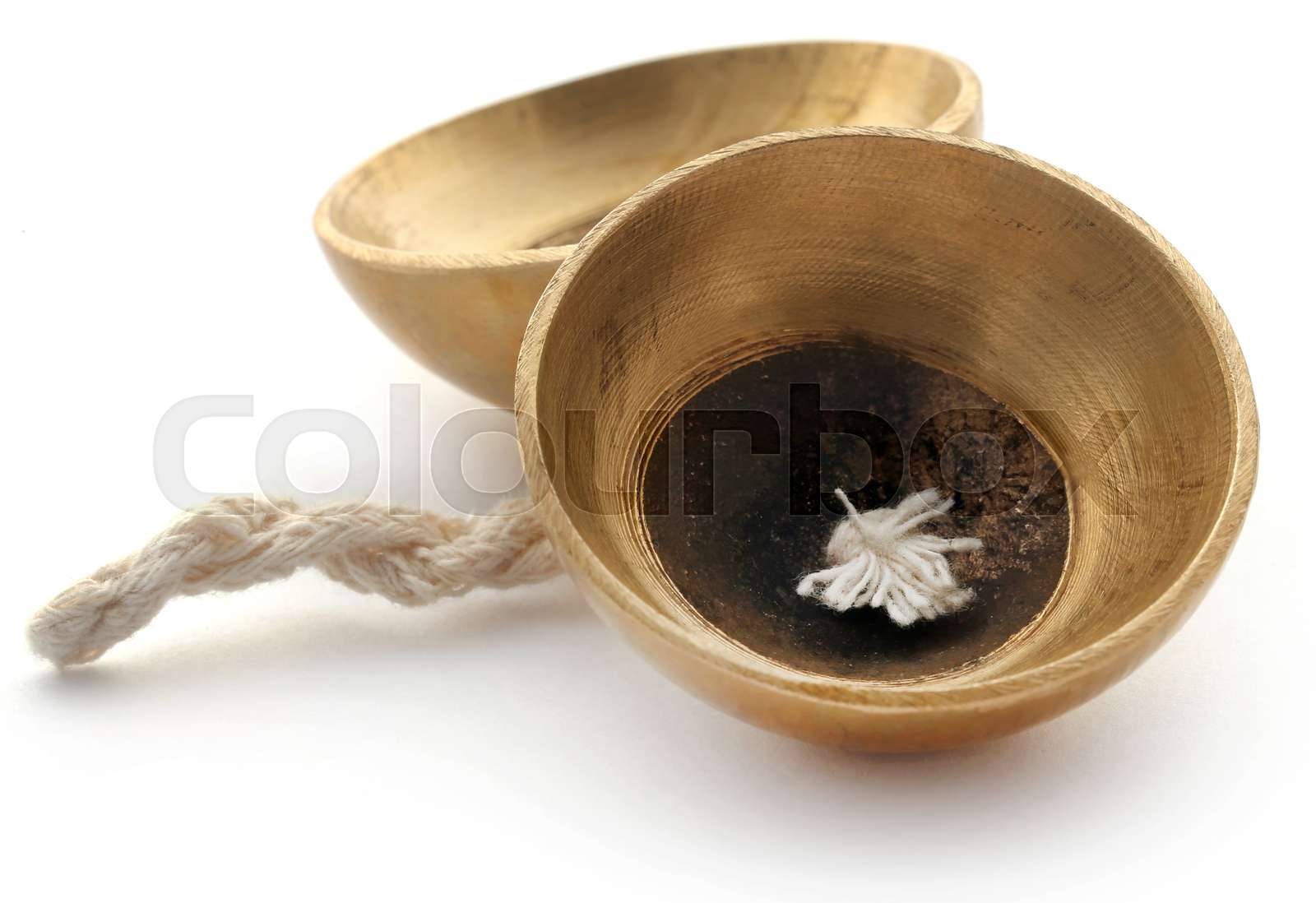 Indian musical instrument named as Manzira | Stock image | Colourbox