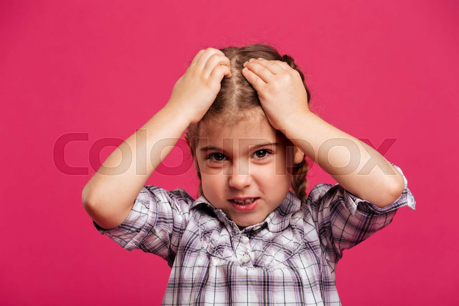 Confused cute little girl child | Stock image | Colourbox