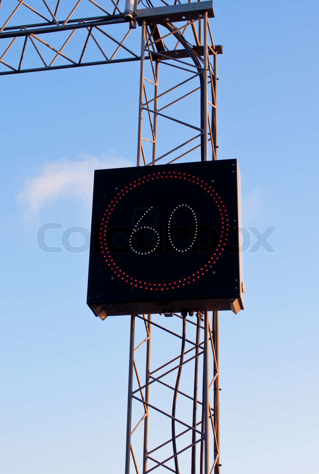 Electronic speed limit sign 60 on a highway | Stock image | Colourbox