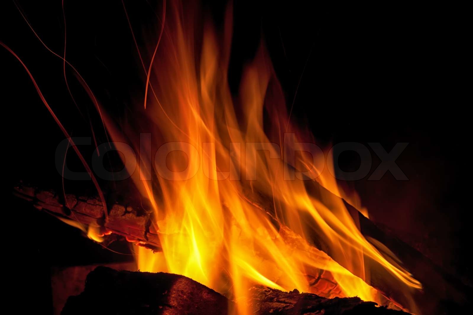 A small fire in the fireplace to smoke | Stock image | Colourbox