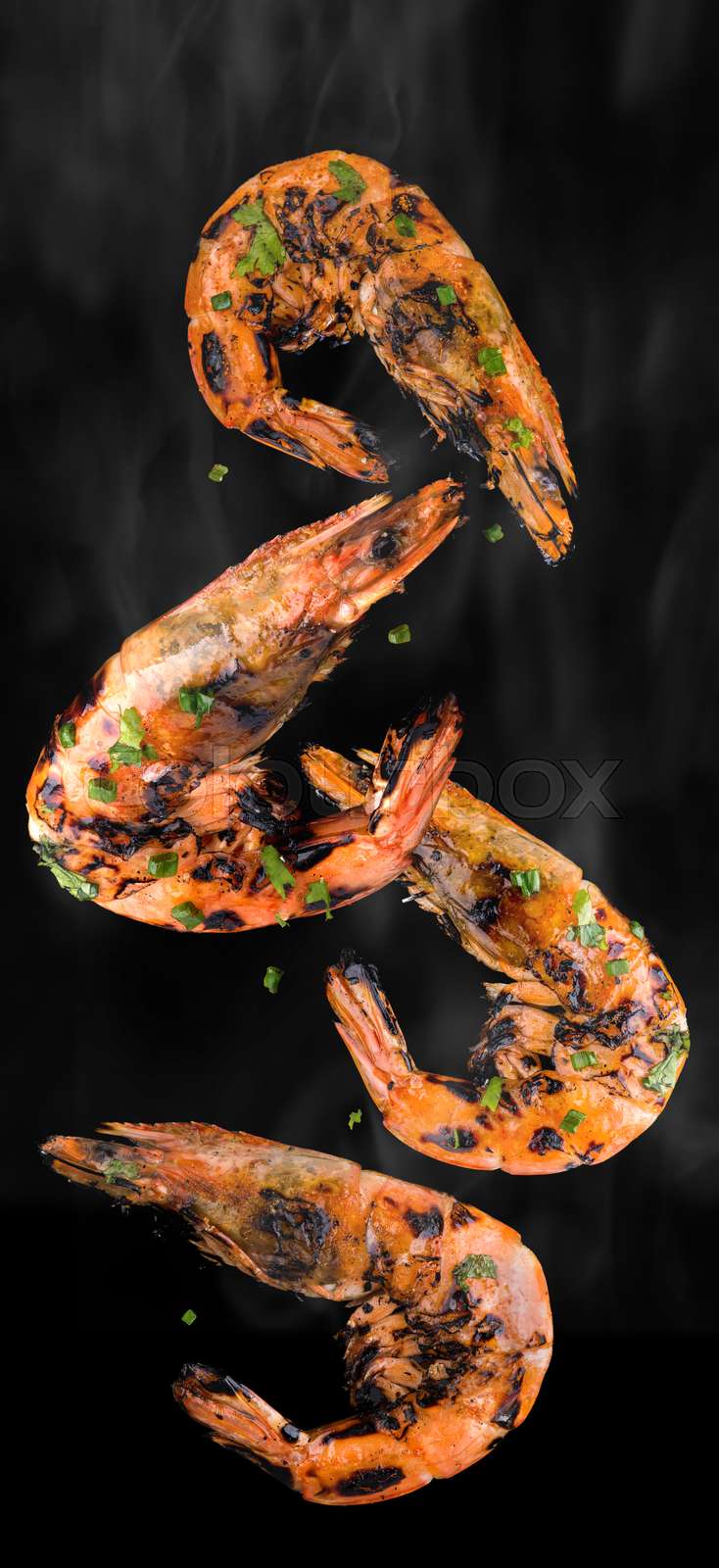 Barbeque grilled prawns with spicy ingredients. | Stock image | Colourbox