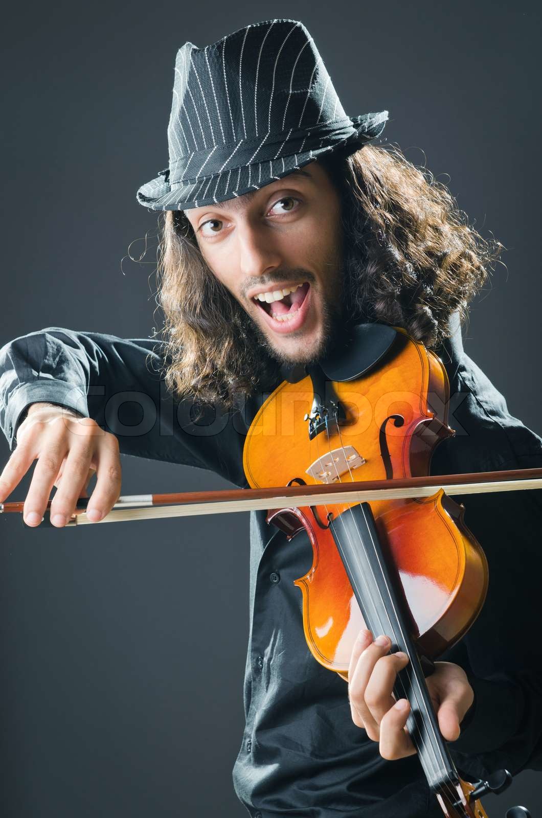 Fiddler playing the violin | Stock image | Colourbox