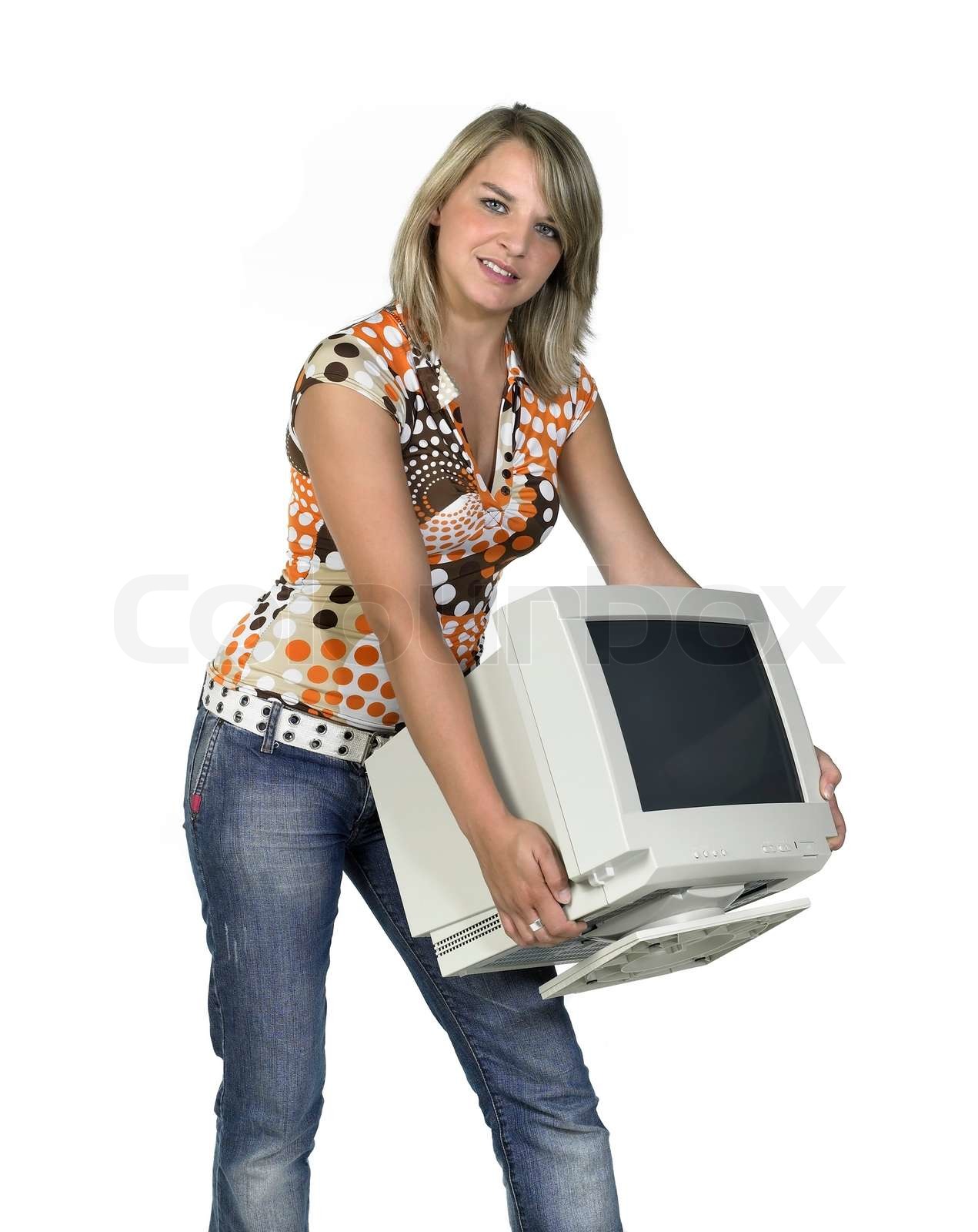 cute girl carrying a computer monitor | Stock image | Colourbox