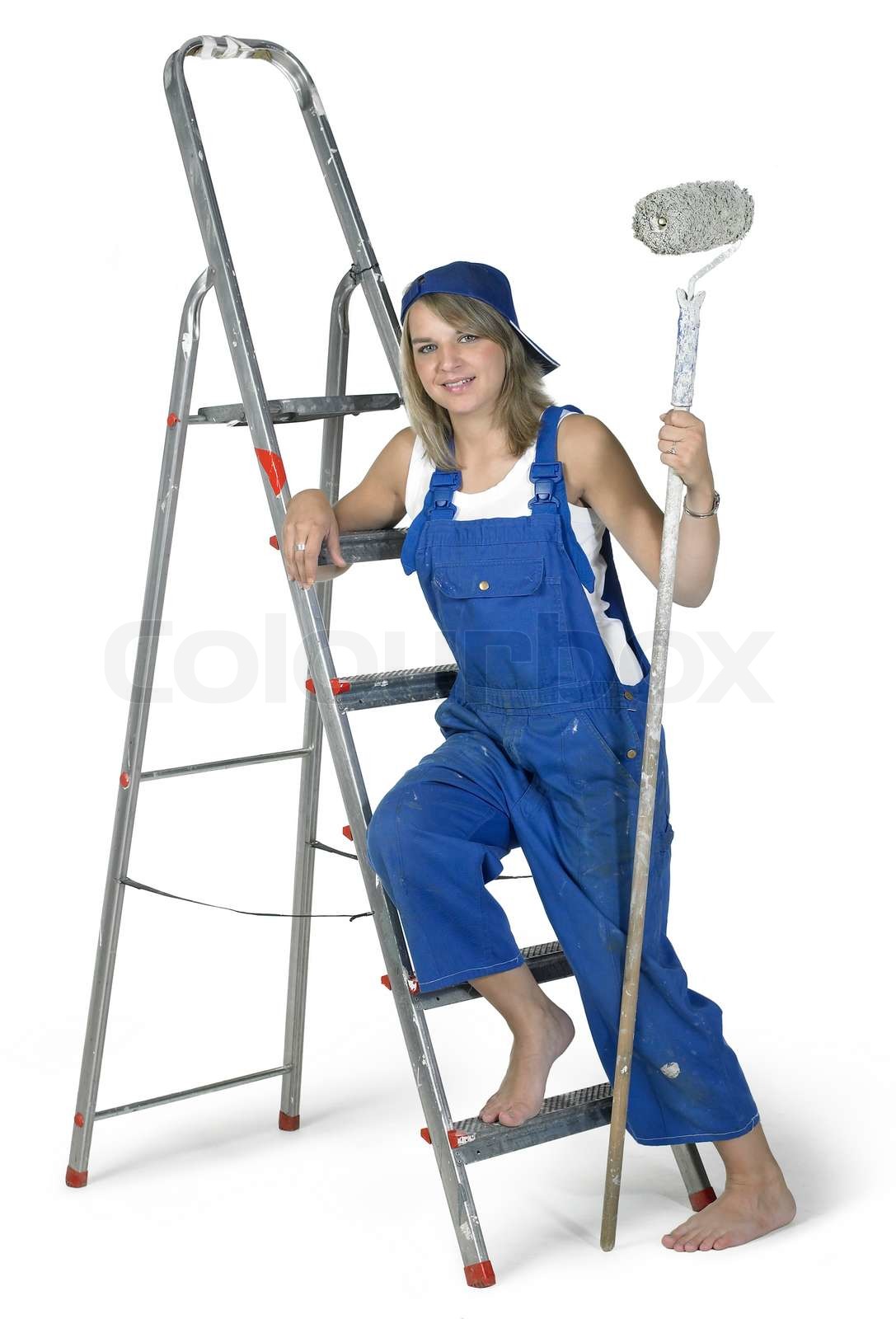 painting girl lean on a ladder | Stock image | Colourbox