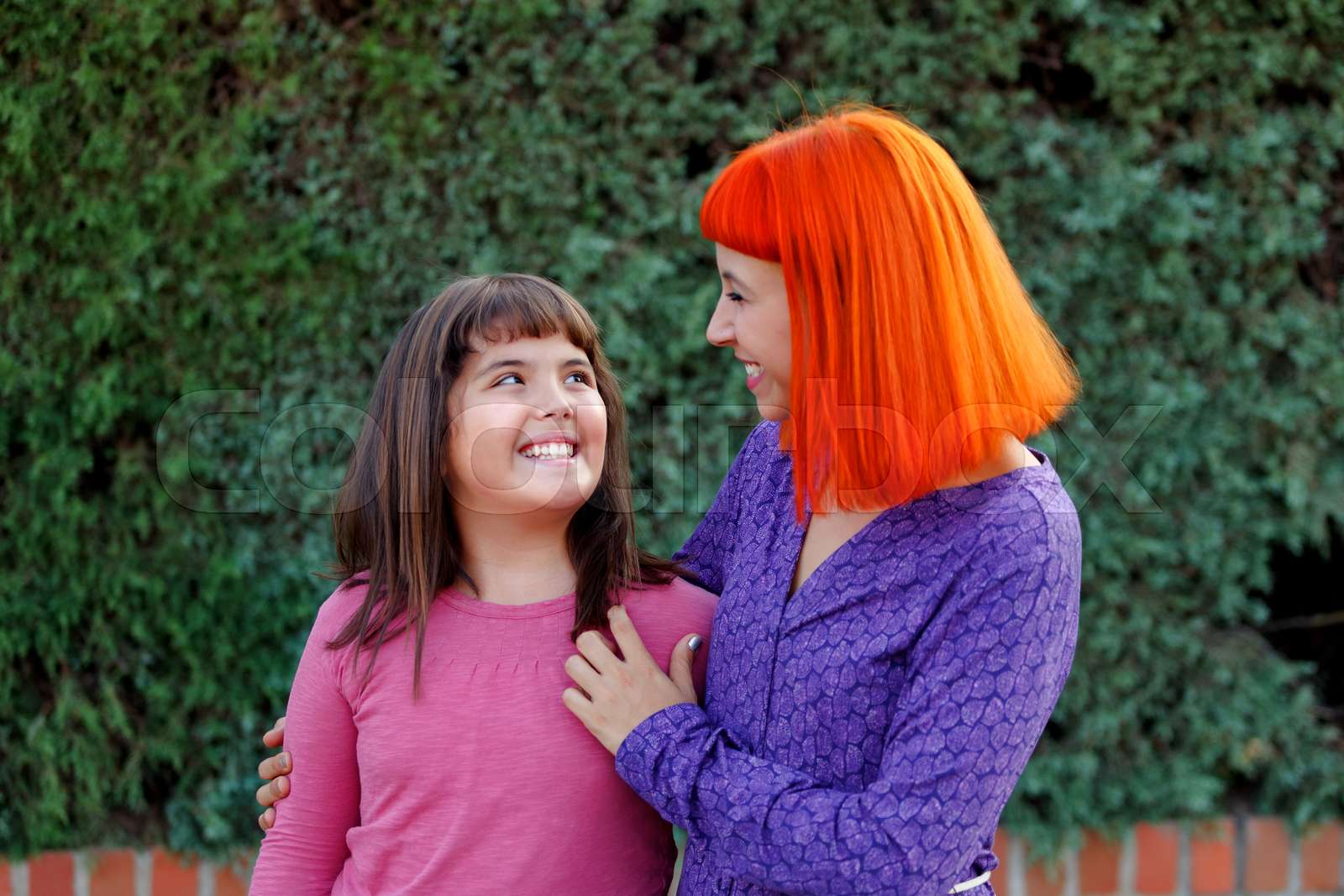 Red Haired Mom And Her Daughter Stock Image Colourbox
