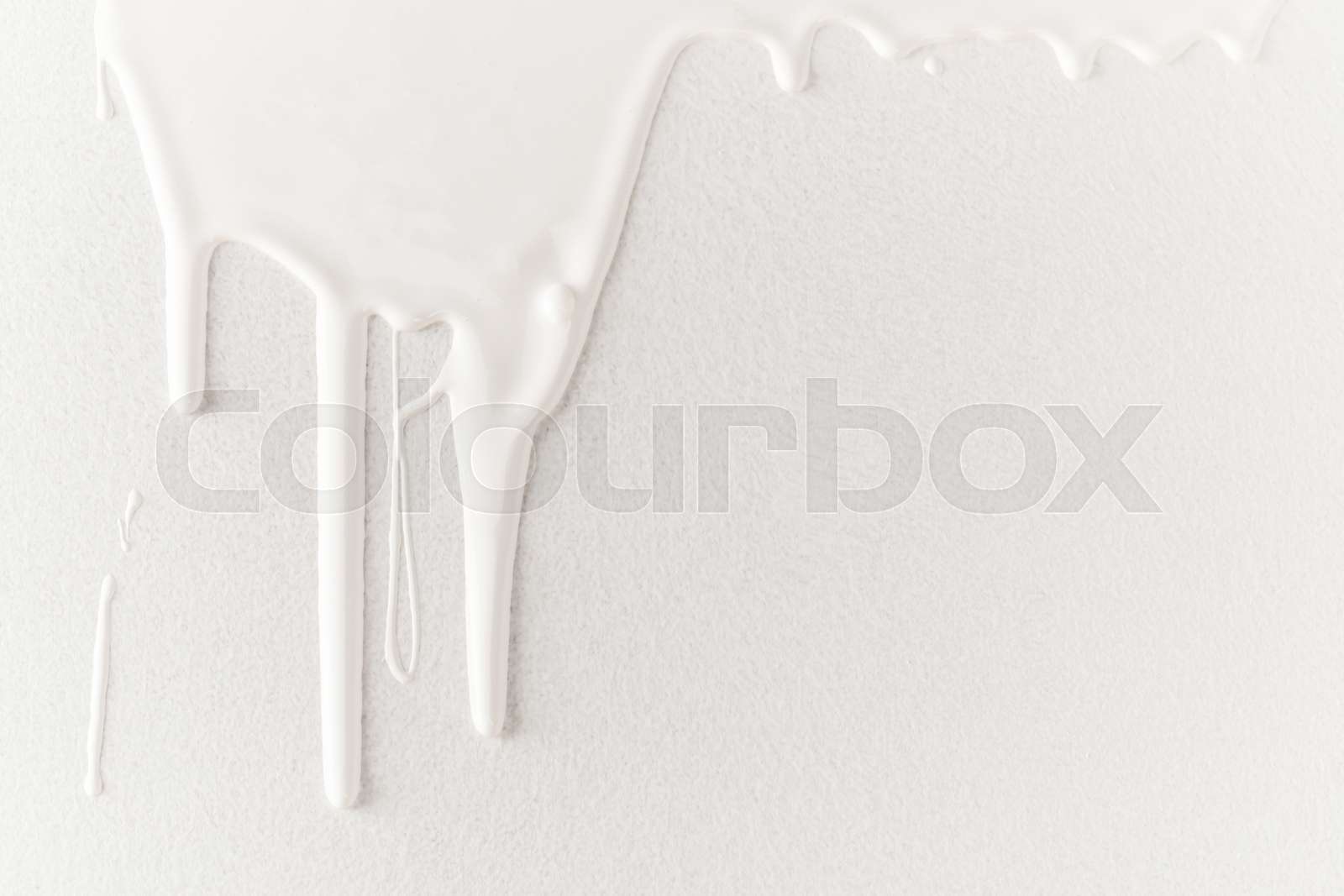 white dripping paint on white surface | Stock image | Colourbox
