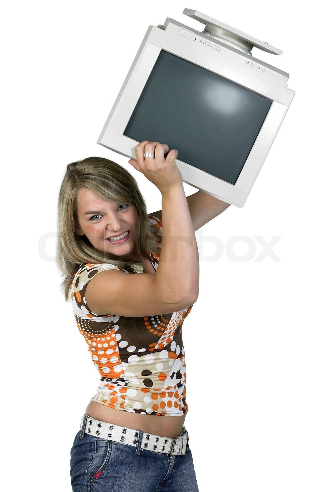 girl throwing a computer monitor | Stock image | Colourbox